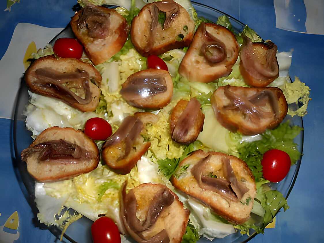 Recette de Frisée croutons aux anchois
