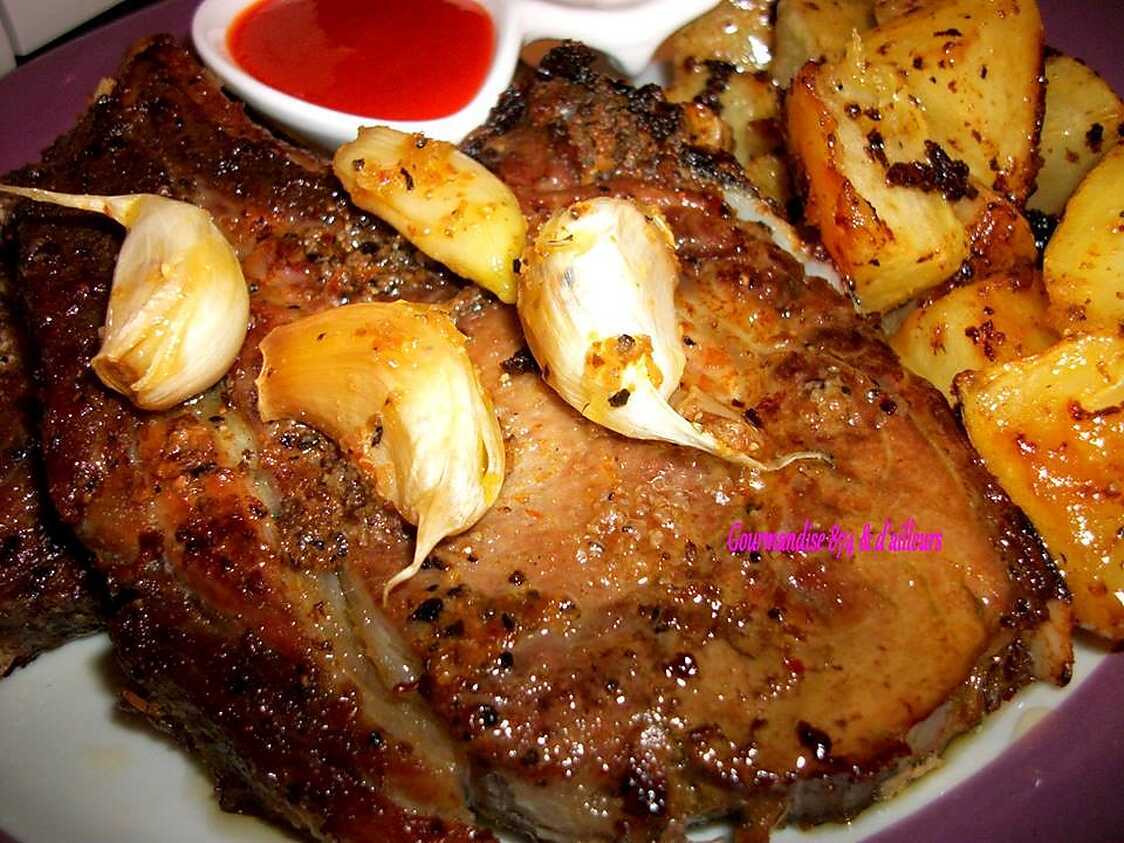 Recette de Côtes de porc marinées à l'ail, cuites au four par La ...